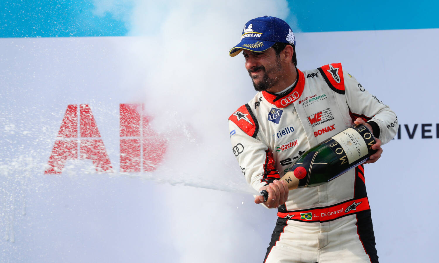 Lucas di Grassi celebrates on the podium on Saturday in New York - Audi ...